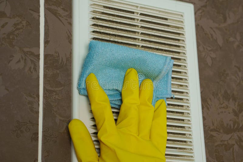 A Layer of Dust on the Ventilation Grate.Dust is Wiped with a Cloth ...
