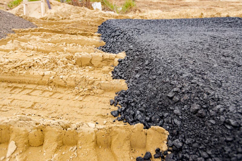 A Layer of Fresh and Hot, Asphalt on the Sand Stock Image - Image of ...