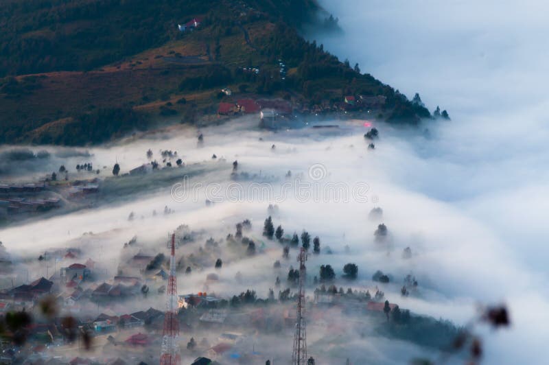 Layer of Mist Over the Mountains and in a Village Stock Photo - Image ...
