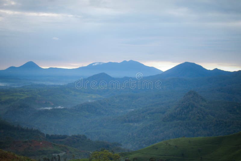 Layer of mountain, low key stock image. Image of cloud - 244301397