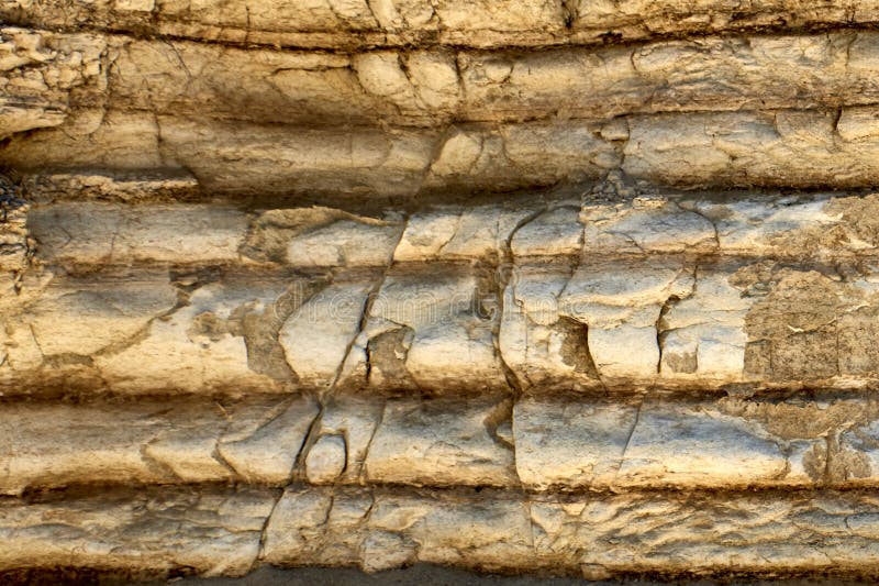 Layer of sedimentary rocks stock image. Image of rock - 205560785