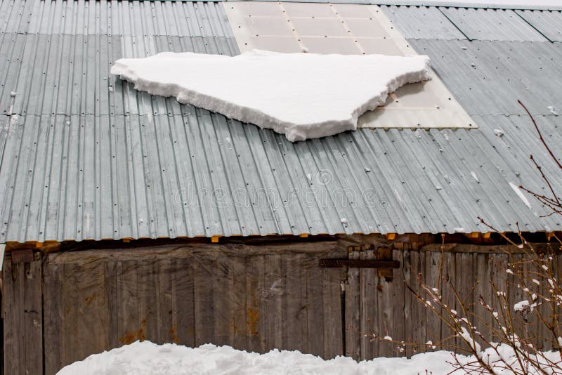 A Layer of Snow in the Spring on the Roof Stock Image - Image of ...