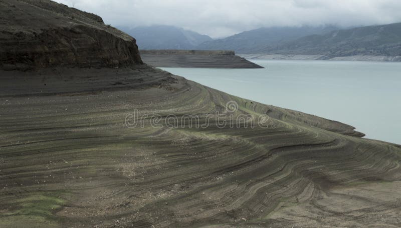 Layered Lake Shore after Draining Stock Image - Image of lake, mountain ...
