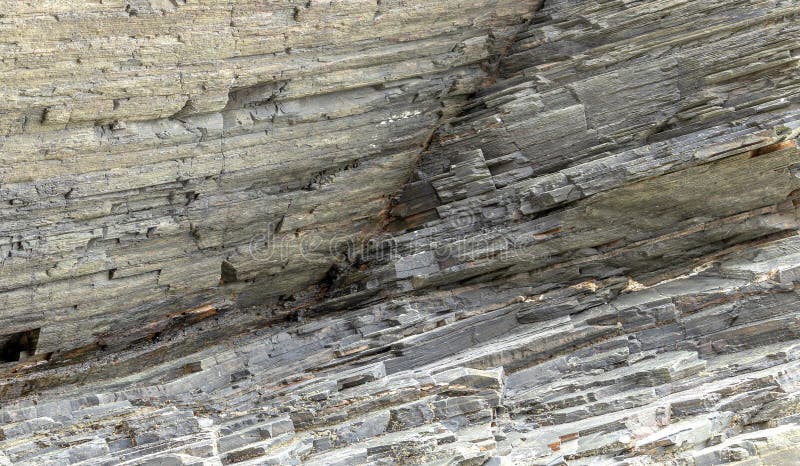 Layered Rock Formation with Distinct Horizontal Lines and Textures ...