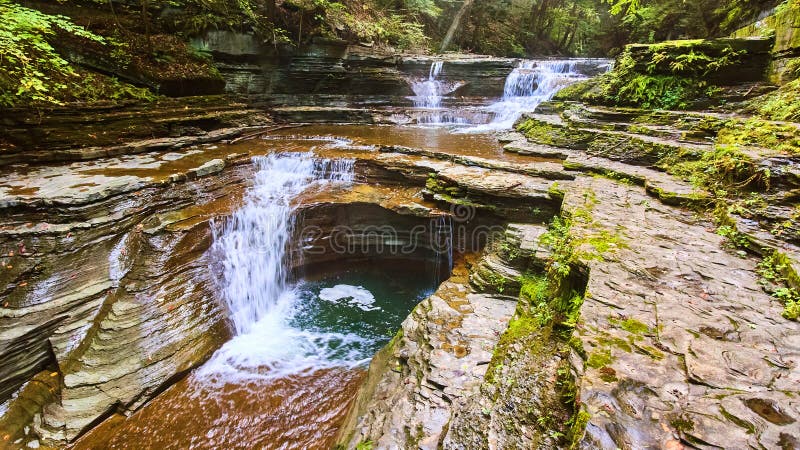 Layered Rocks and Walking Path Along Gorge with Pair of Waterfalls in ...