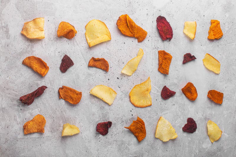 Layered Rows of Vegetable Chips on a Concrete Background Stock Image ...
