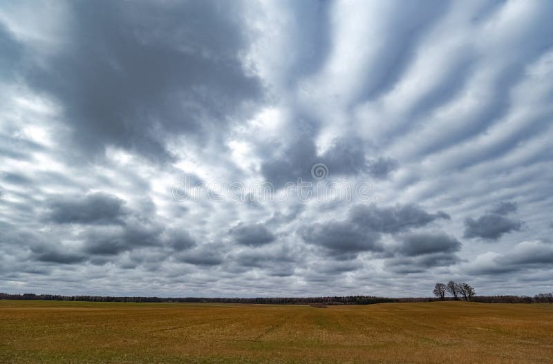 Layered Spring Clouds Over the Fields, Three Trees on the Mountain ...