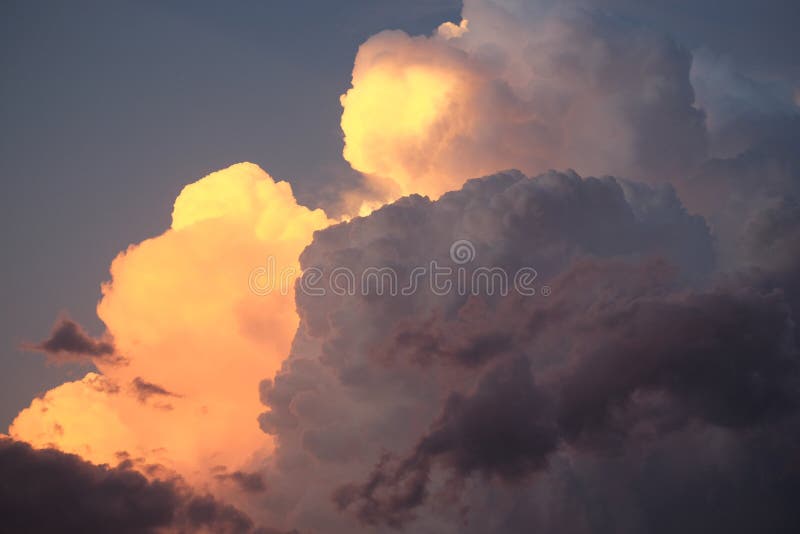 Layered Sunlit Thunderhead Storm Clouds Stock Photo - Image of puffy ...