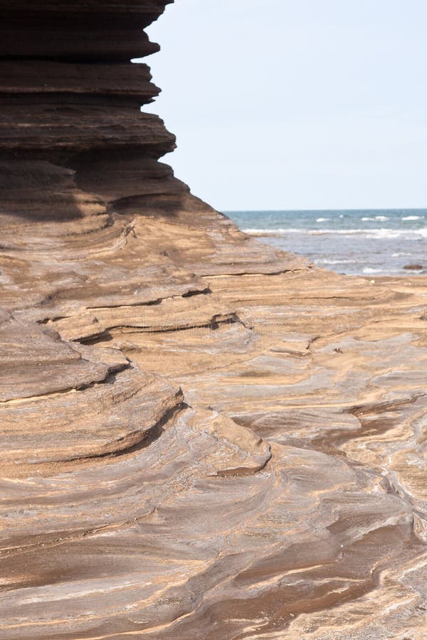 Layered Volcanic Rock Formation Stock Image - Image of beach, coast ...