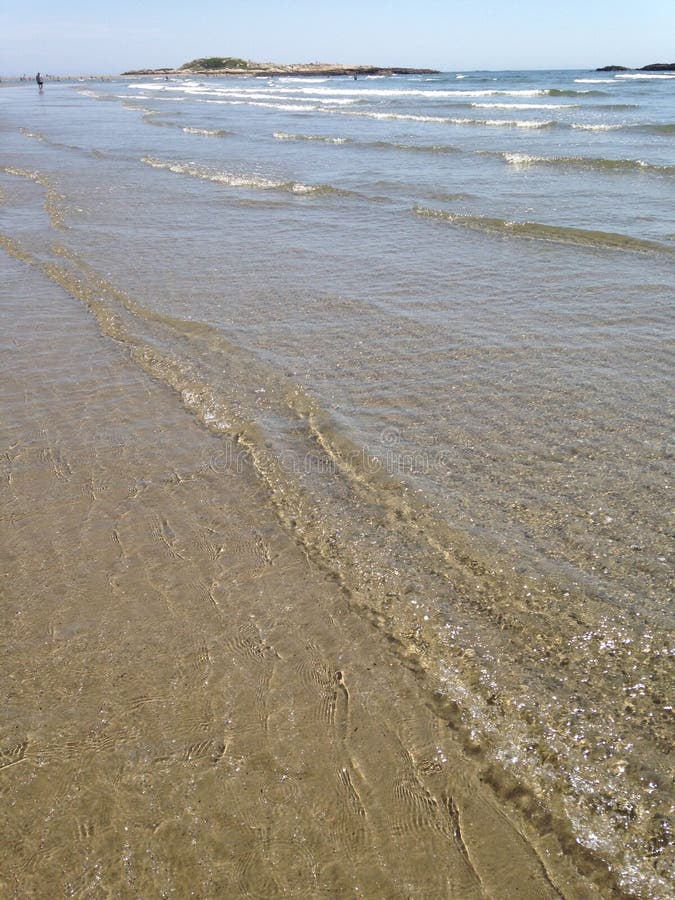 Waves and rippled sand stock photo. Image of layers - 117835160