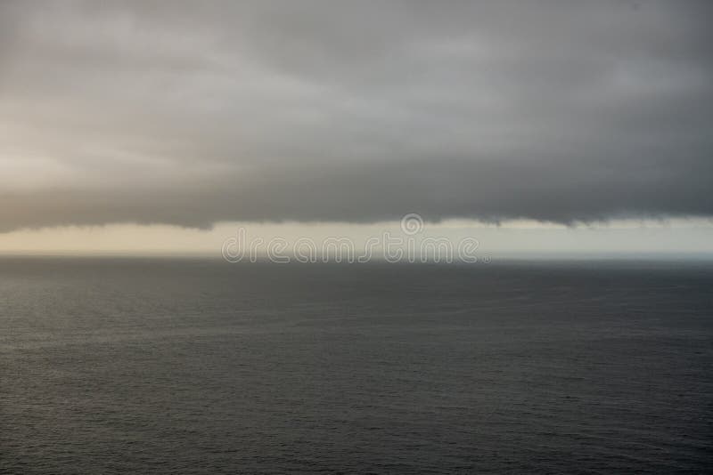 Layers of Gray Clouds and the Pacific Ocean Stock Image - Image of ...