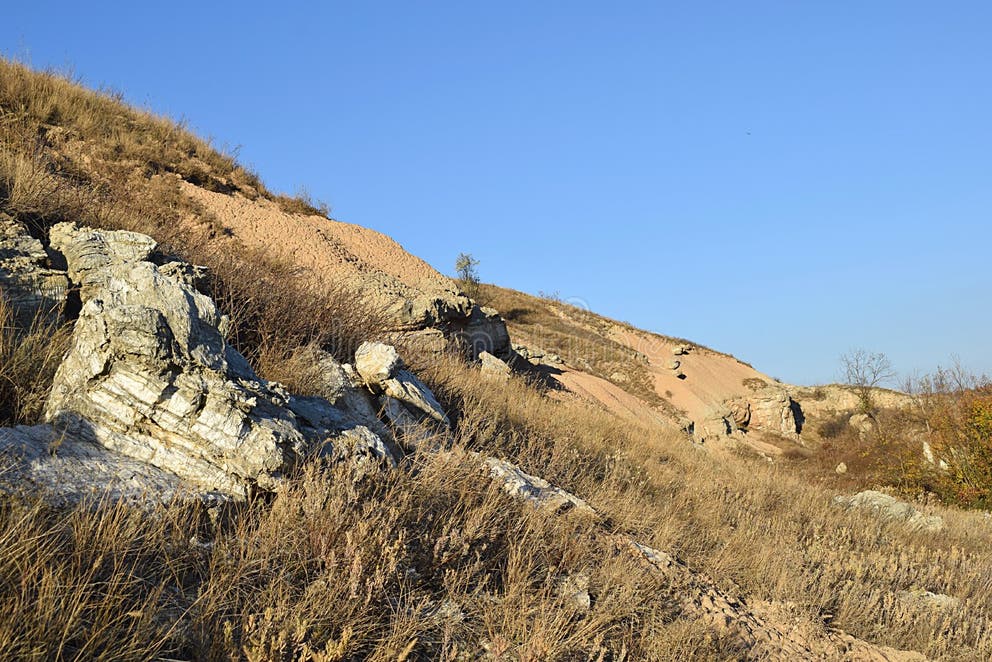 Layers of Gypsum on the Slope. Stock Photo - Image of crust, gray ...