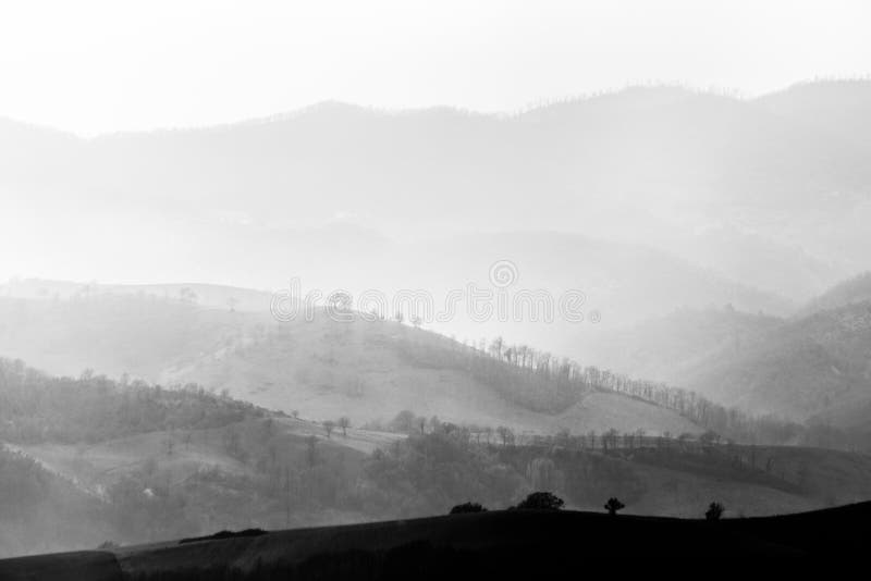 Layers of Hills and Mountains with Mist between Them Stock Image ...