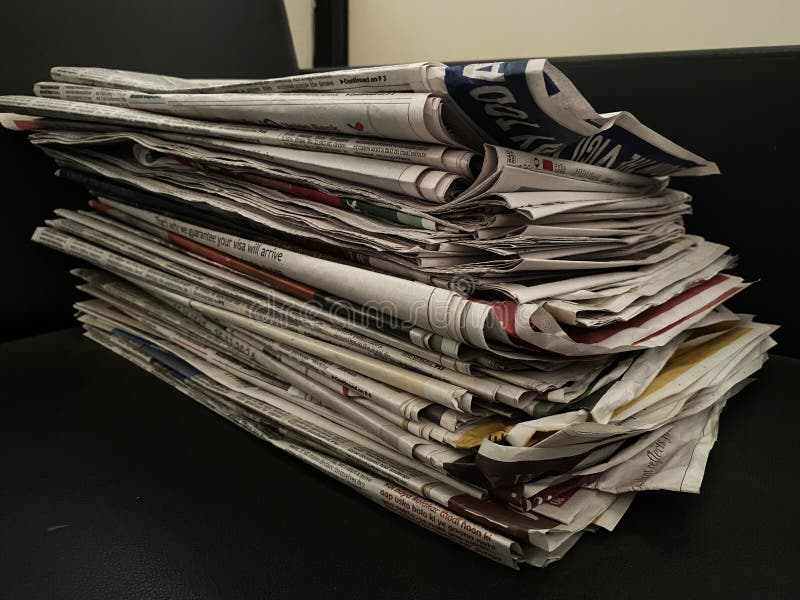 The Layers Reveal Headlines and Articles, Exuding a Nostalgic Charm and ...