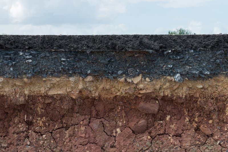 Layers of Road with Soil and Rock Stock Photo - Image of orange ...