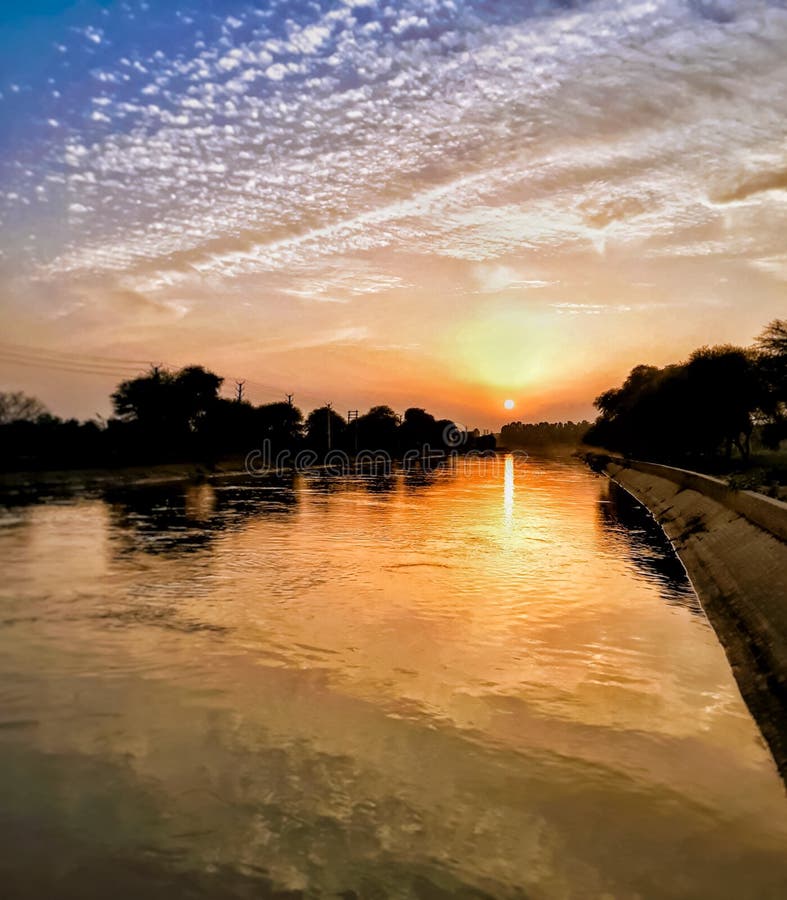 Layers of Sunset stock photo. Image of cloud, river - 195932708