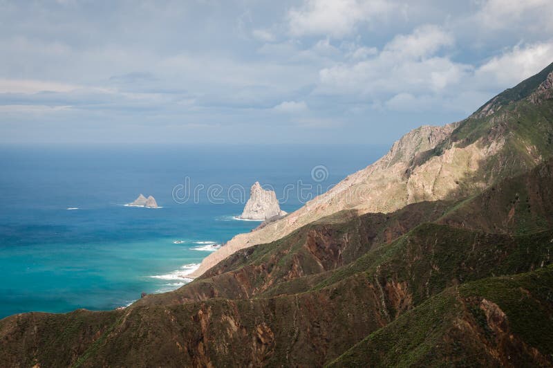 Layers of vulcanic shore stock image. Image of green - 33457129
