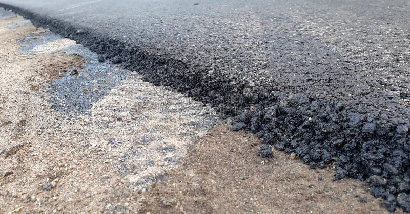 Laying Asphalt on Compacted Soil Stock Image - Image of highway ...