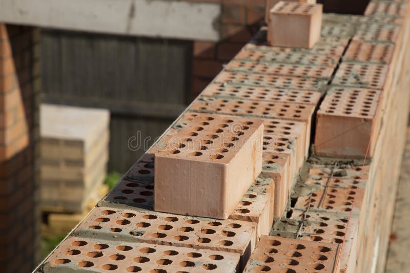 Laying Bricks. Construction of a New House Stock Image - Image of ...