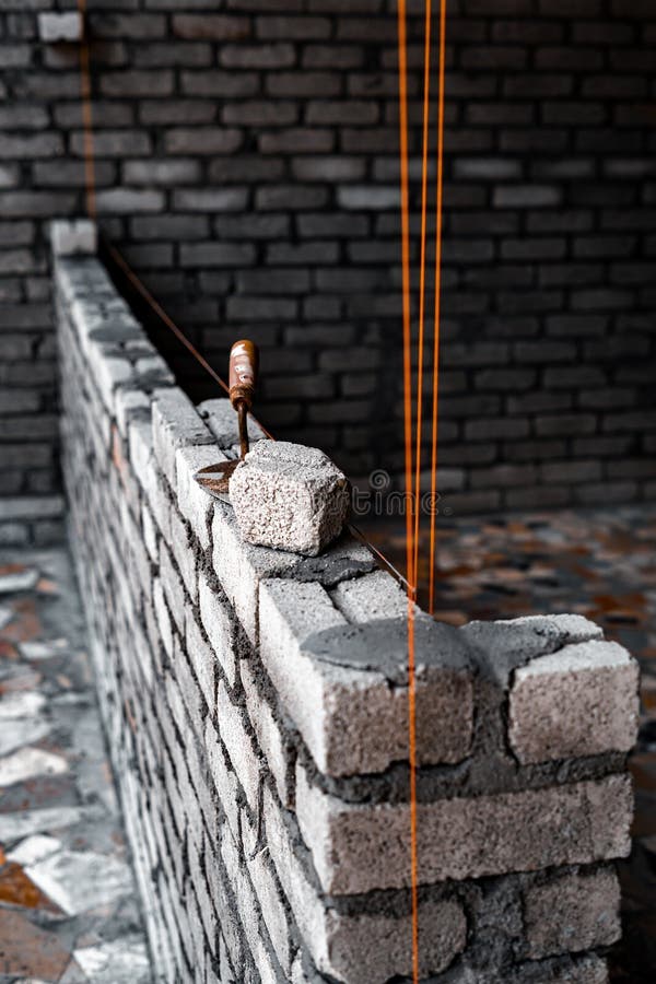 Laying Bricks. Construction of a New House. Construction of a Brick ...