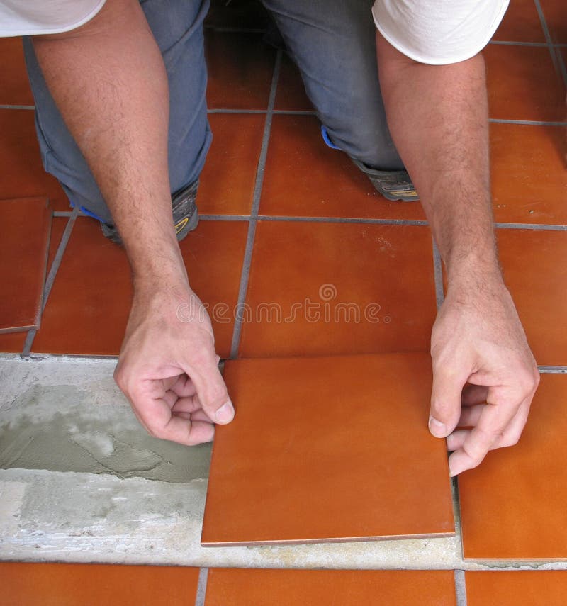 Laying ceramic tile stock photo. Image of handyman, geometric - 3585576