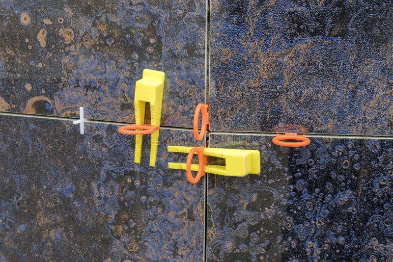 Laying Ceramic Tiles for the Floor Stock Image - Image of clamp ...