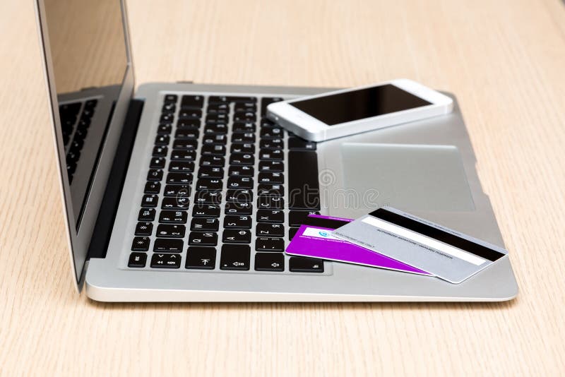 Laying Credit Cards and Phone on a Laptop Stock Image - Image of mobile ...