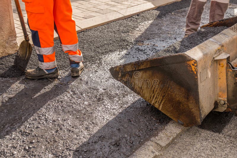 Laying Down a New Asphalt Layer for a Sidewalk Stock Photo - Image of ...