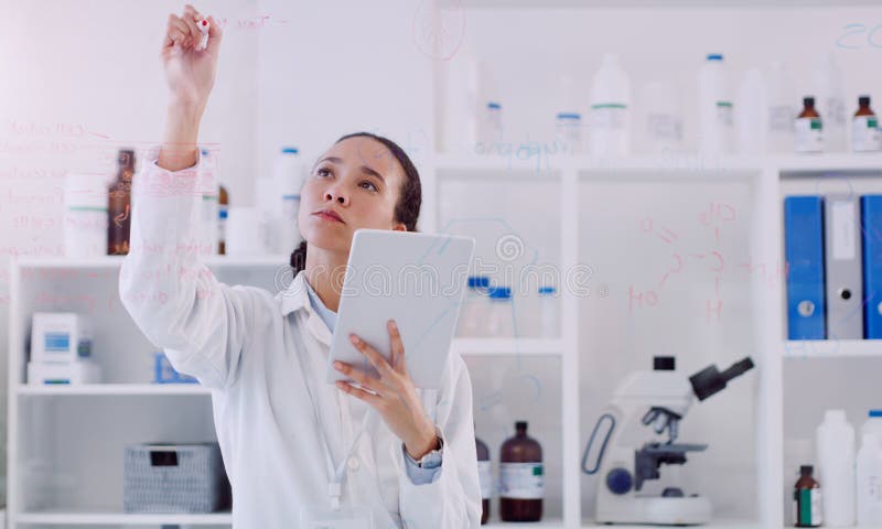 Laying Down the Structure of Her Findings. a Young Scientist Writing ...