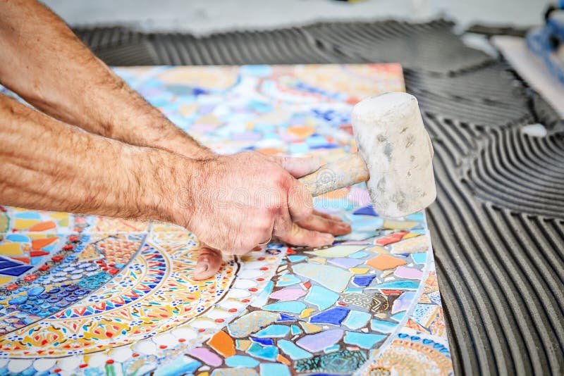 Laying floor ceramic tile stock photo. Image of crest - 112458572