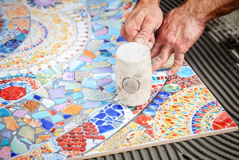 Laying floor ceramic tile stock photo. Image of crest - 115709614