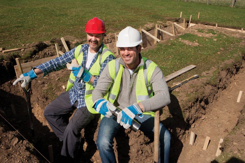 Laying Foundations stock image. Image of concrete, smiling - 31051313