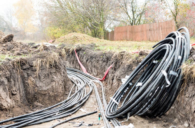 Laying of High-voltage Cable Lines in the Earth Trench Stock Photo ...