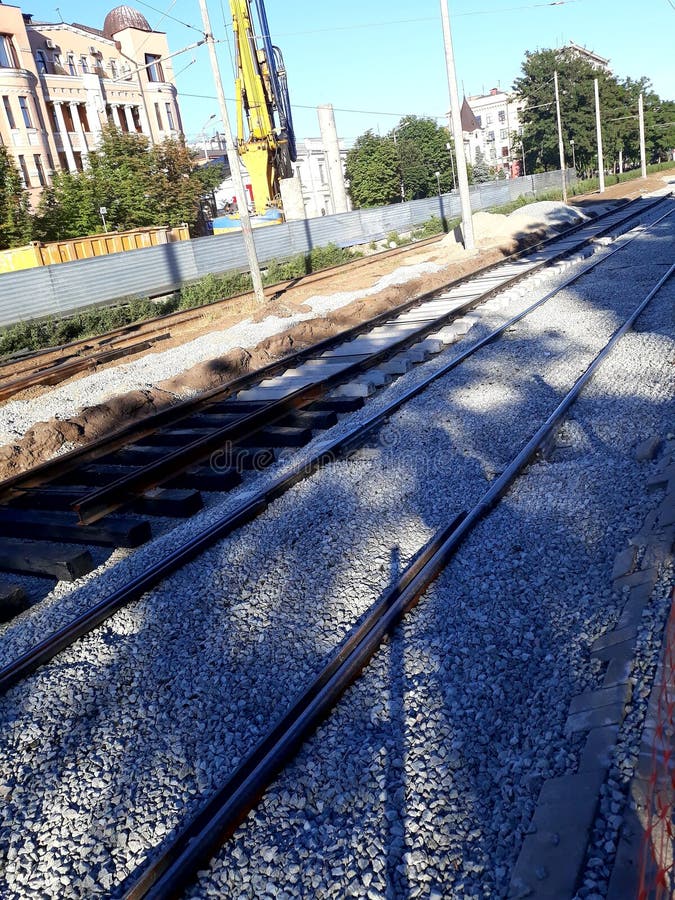 Laying and Installation of New Tram Rails Stock Photo - Image of path ...
