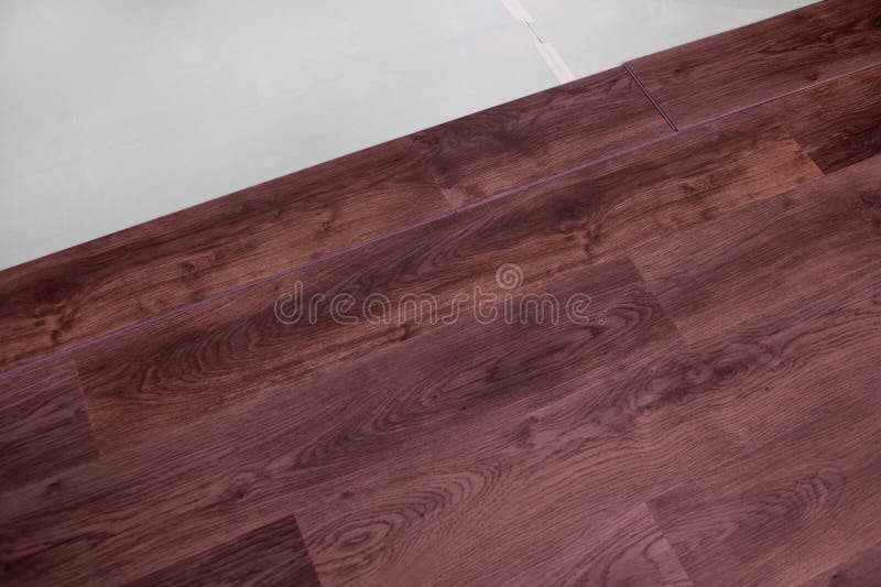 Laying Laminate Boards or Parquet on the Underlying Floor Layer Stock ...