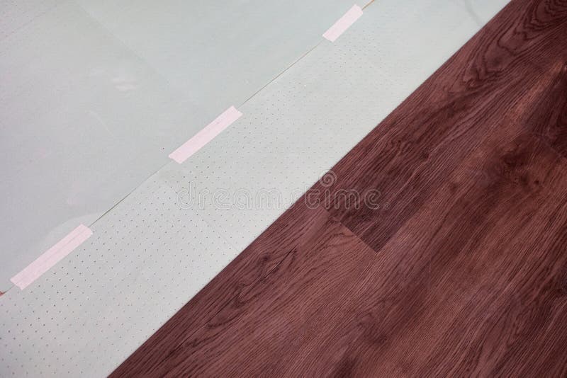Laying Laminate Boards or Parquet on the Underlying Floor Layer Stock ...
