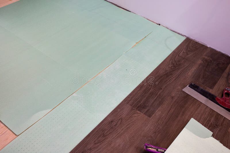 Laying Laminate Boards or Parquet on the Underlying Floor Layer Stock ...