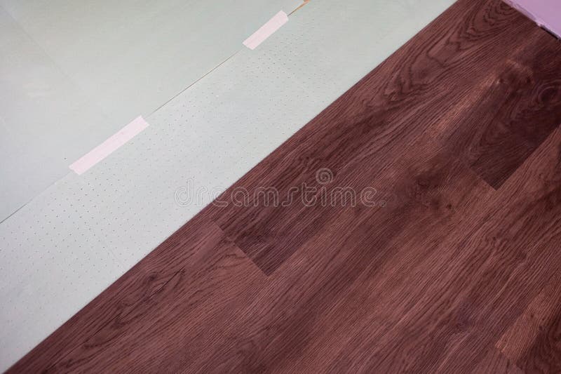 Laying Laminate Boards or Parquet on the Underlying Floor Layer Stock ...