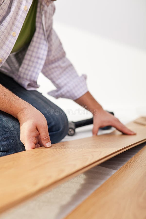 Laying Laminate Flooring - Closeup Stock Image - Image of employee ...