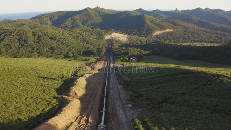 Laying the Main Gas Pipe in a Dug Trench among the Mountains Stock ...