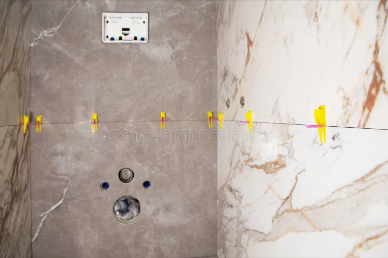 Laying Modern Large Format Tiles with the Tile Leveling System in the ...