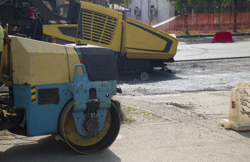 Laying of New Asphalt on the Highway. Road Repairs Stock Photo - Image ...