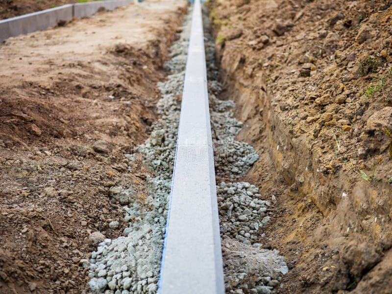 Laying of a New Concrete Curb. Creating a Pedestrian Path Stock Image ...
