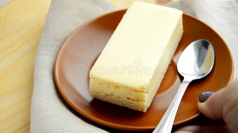 Laying Out a Brown Plate with a Rectangular Slice of Delicious ...