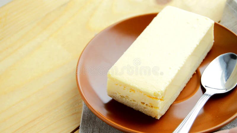 Laying Out a Brown Plate with a Rectangular Slice of Delicious ...