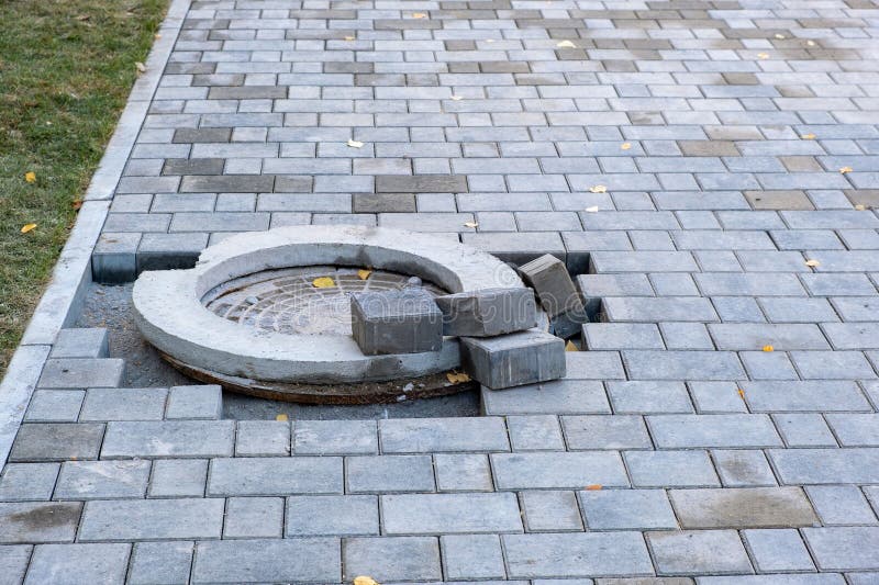 Laying Paving Stones Around the Hatch Stock Photo - Image of ...