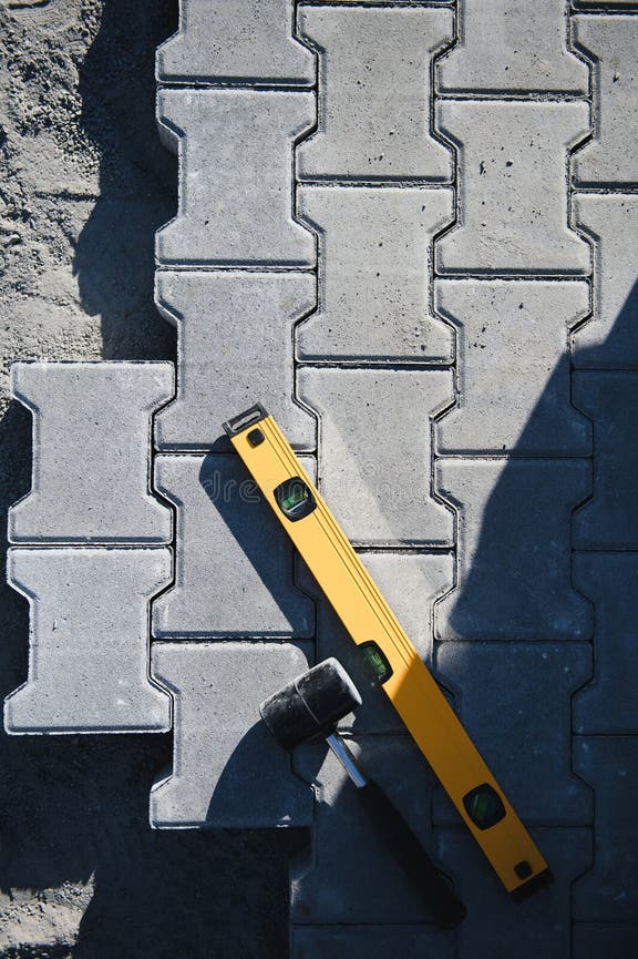 Laying Paving Stones. Paving Tools for Use Stock Photo - Image of ...