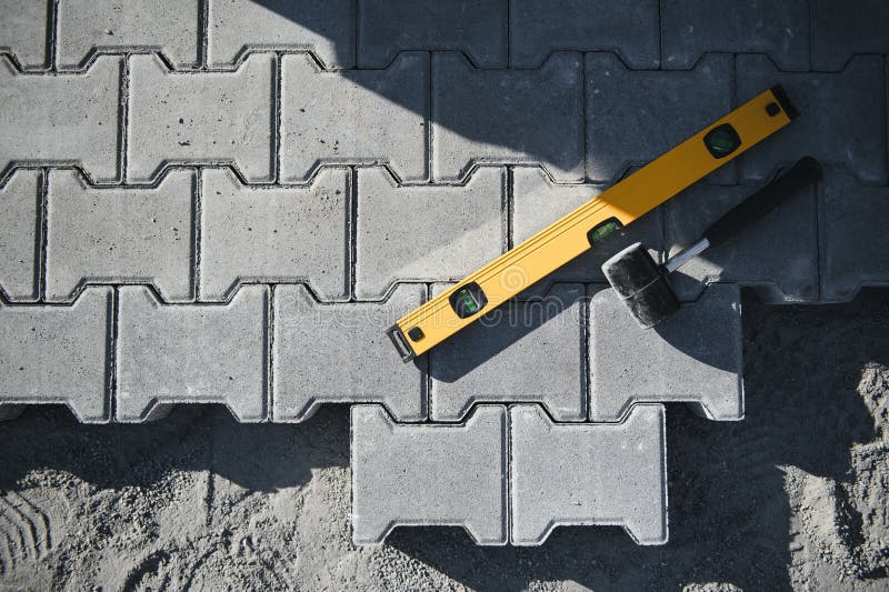Laying Paving Stones. Paving Tools for Use Stock Photo - Image of ...