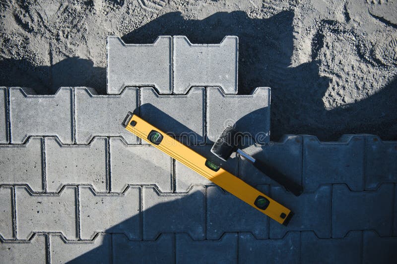 Laying Paving Stones. Paving Tools for Use Stock Photo - Image of ...