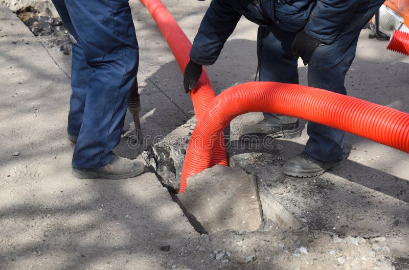 Laying Pipes in the Road Surface. Stock Image - Image of pipe ...